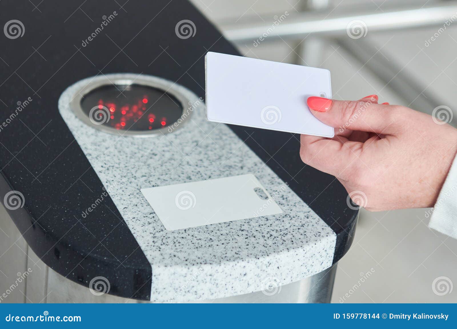 Using Electronic Card Key for Access through Turnstile Stock Photo ...