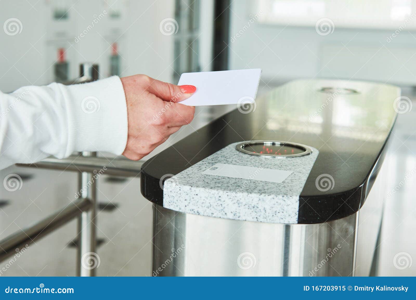 Using Electronic Card Key for Access through Turnstile Stock Image ...