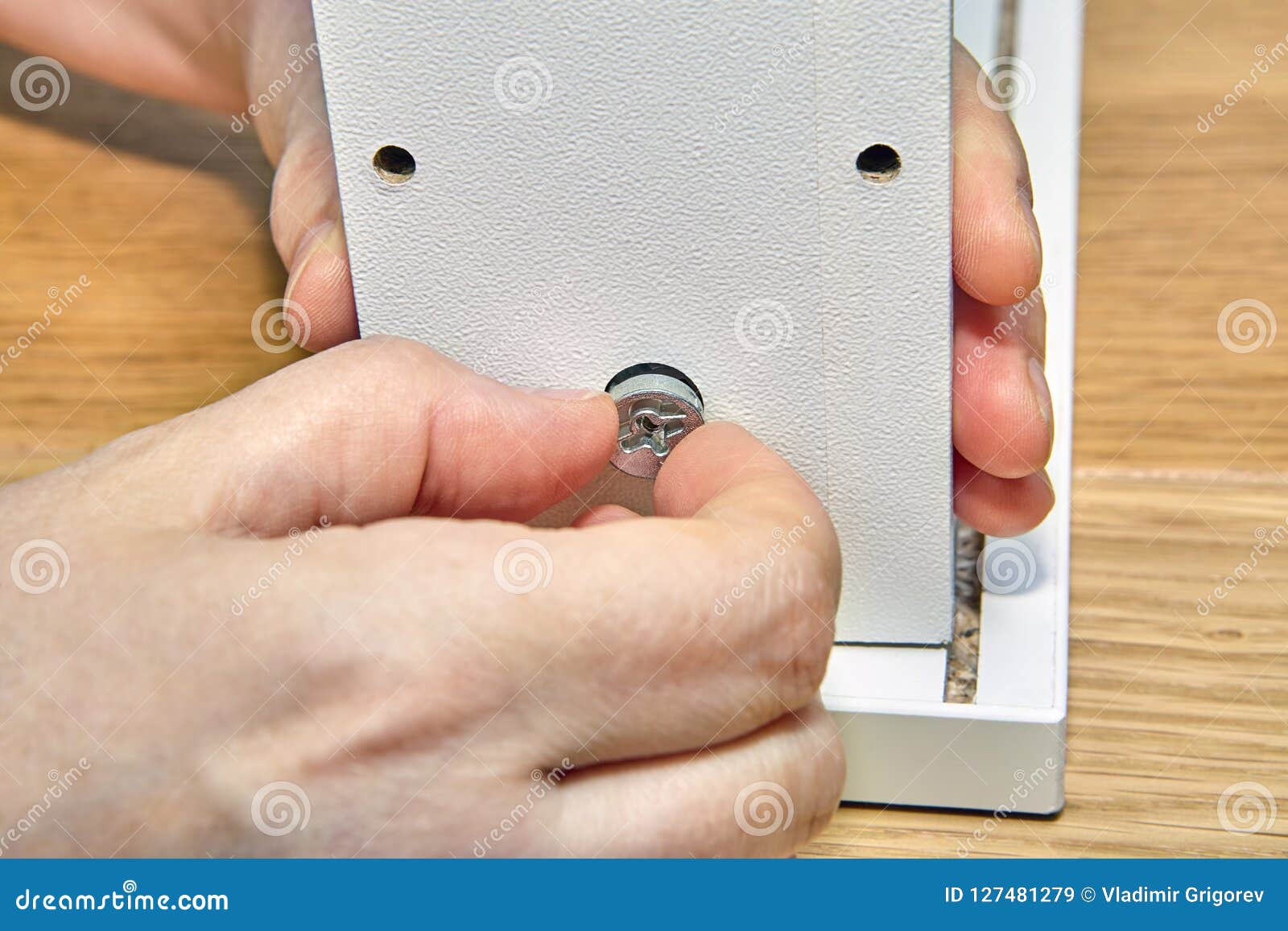 Flat Pack Furniture Assembly, Assembler Inserted Cam Lock Nut. Stock ...