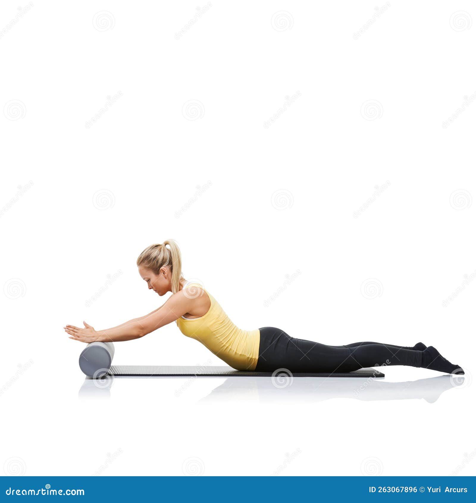 Using a Foam-roller is a Great Way To Warm Up. a Young Woman Using a ...
