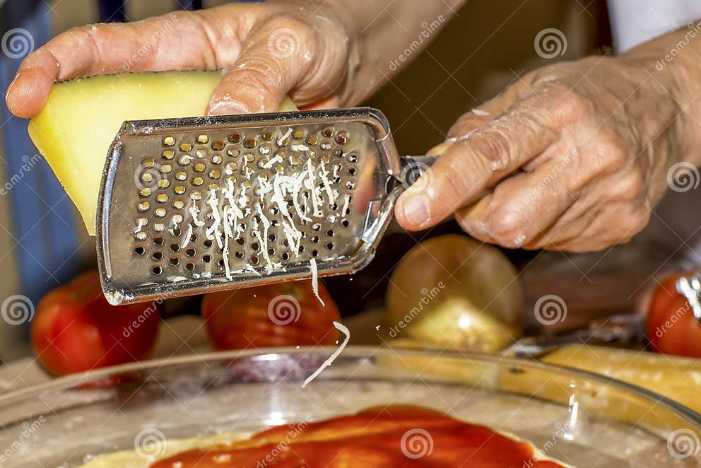 Using a Grater To Grate Cheese Stock Photo - Image of ingredient, home ...