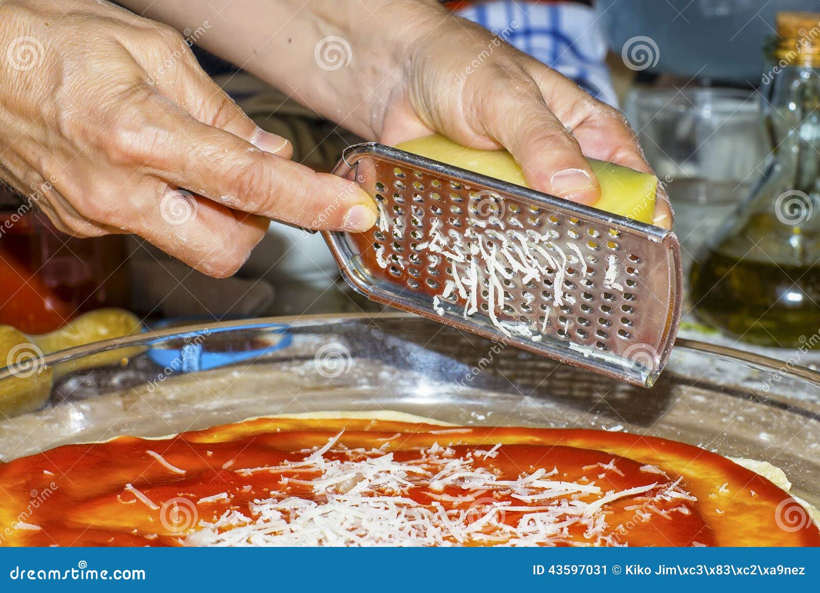 Using a Grater To Grate Cheese Stock Image - Image of food, meal: 43597031