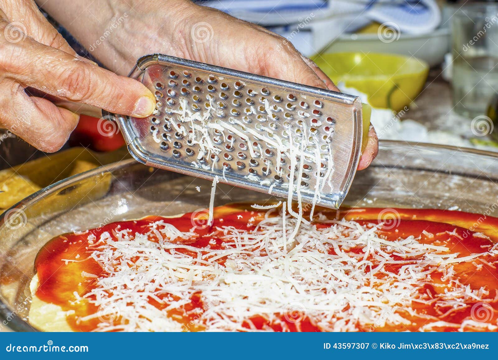 Using a Grater To Grate Cheese Stock Image - Image of tomato, sauce ...