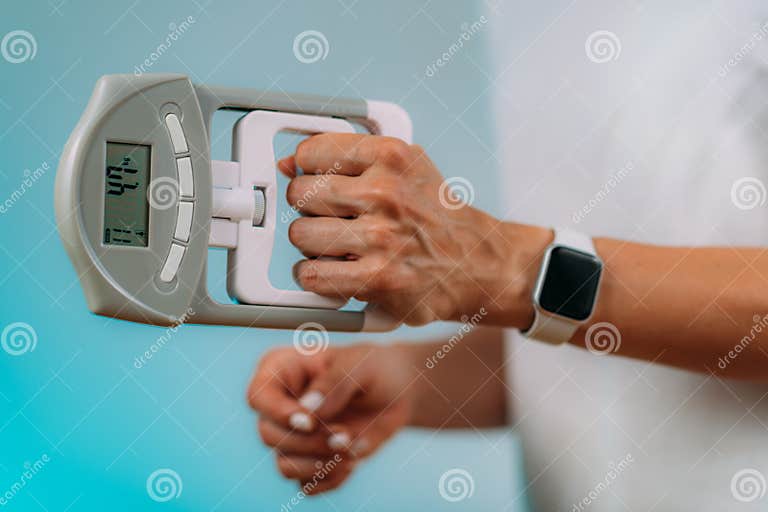Using Hand Dynamometer for Grip Strength Test Stock Image - Image of ...