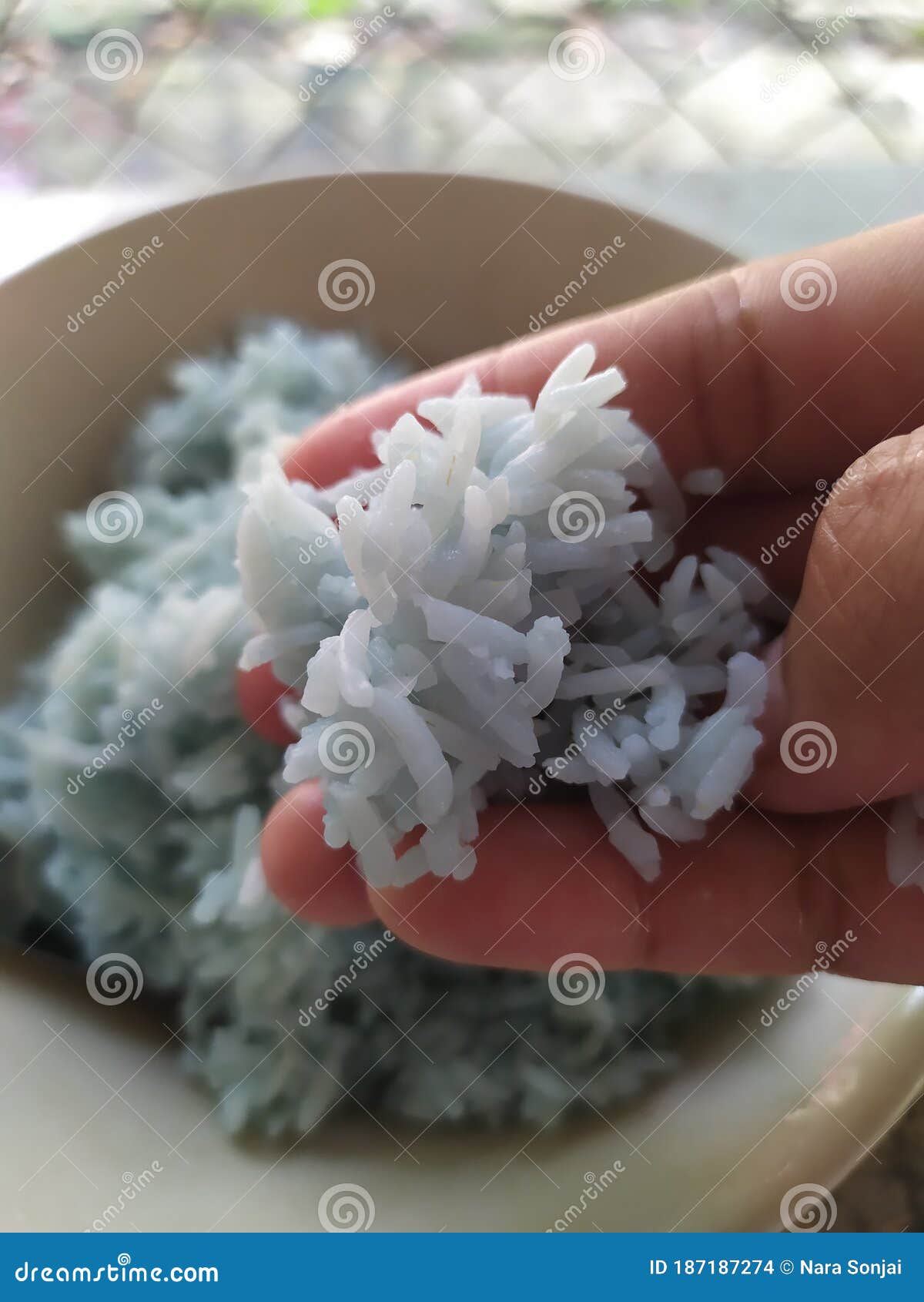 Using a Hand To Scoop Rice To Eat Stock Photo - Image of hand, rice ...