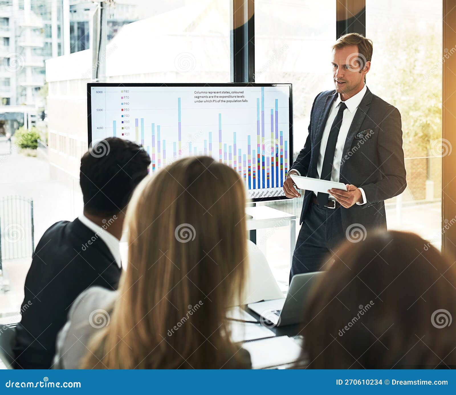 Using His Tablet for Notes on His Presentation. a Businessman Using a ...