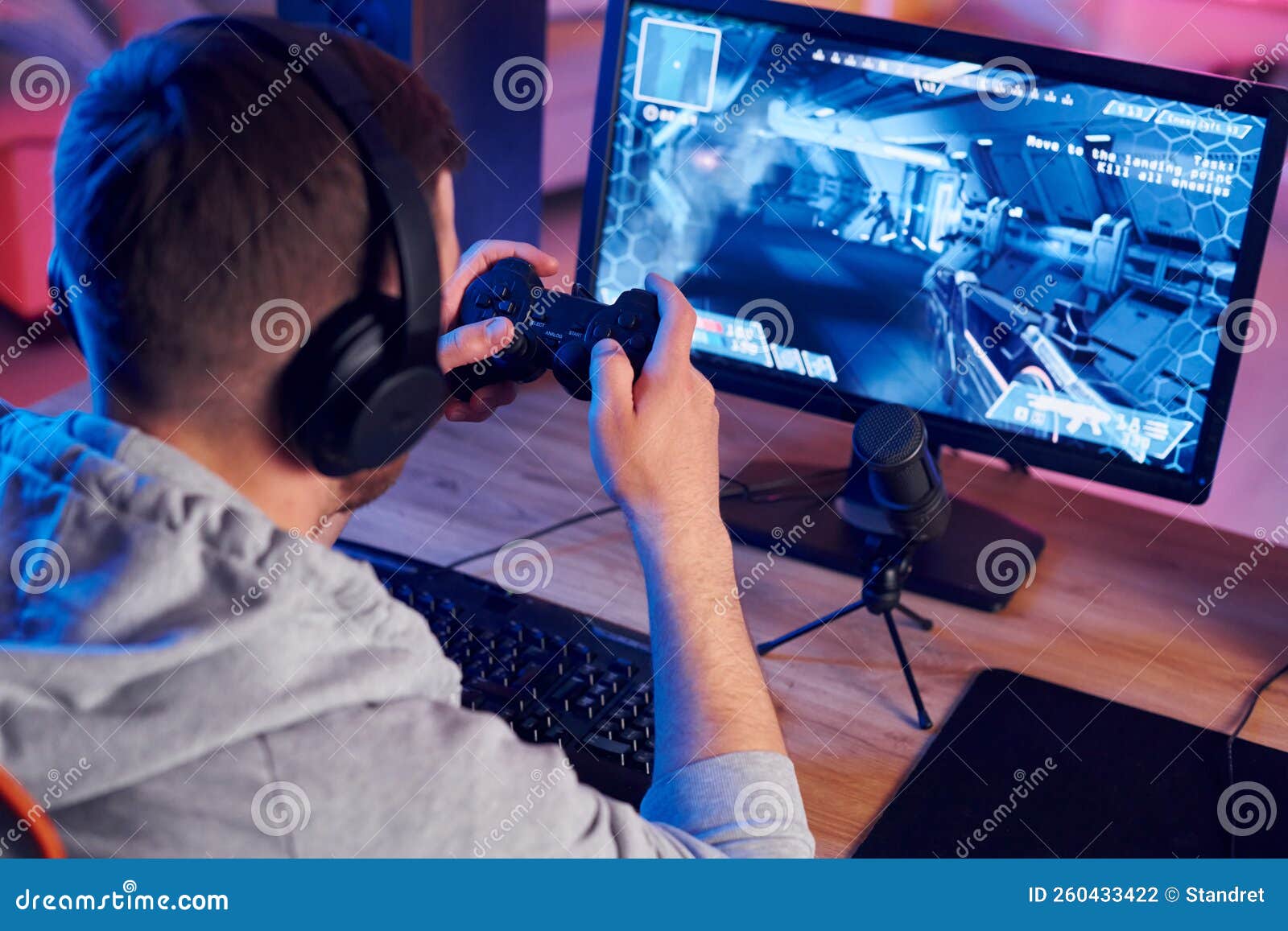 Using the Joystick. Online Streamer Playing FPS Shooter Game at Home ...