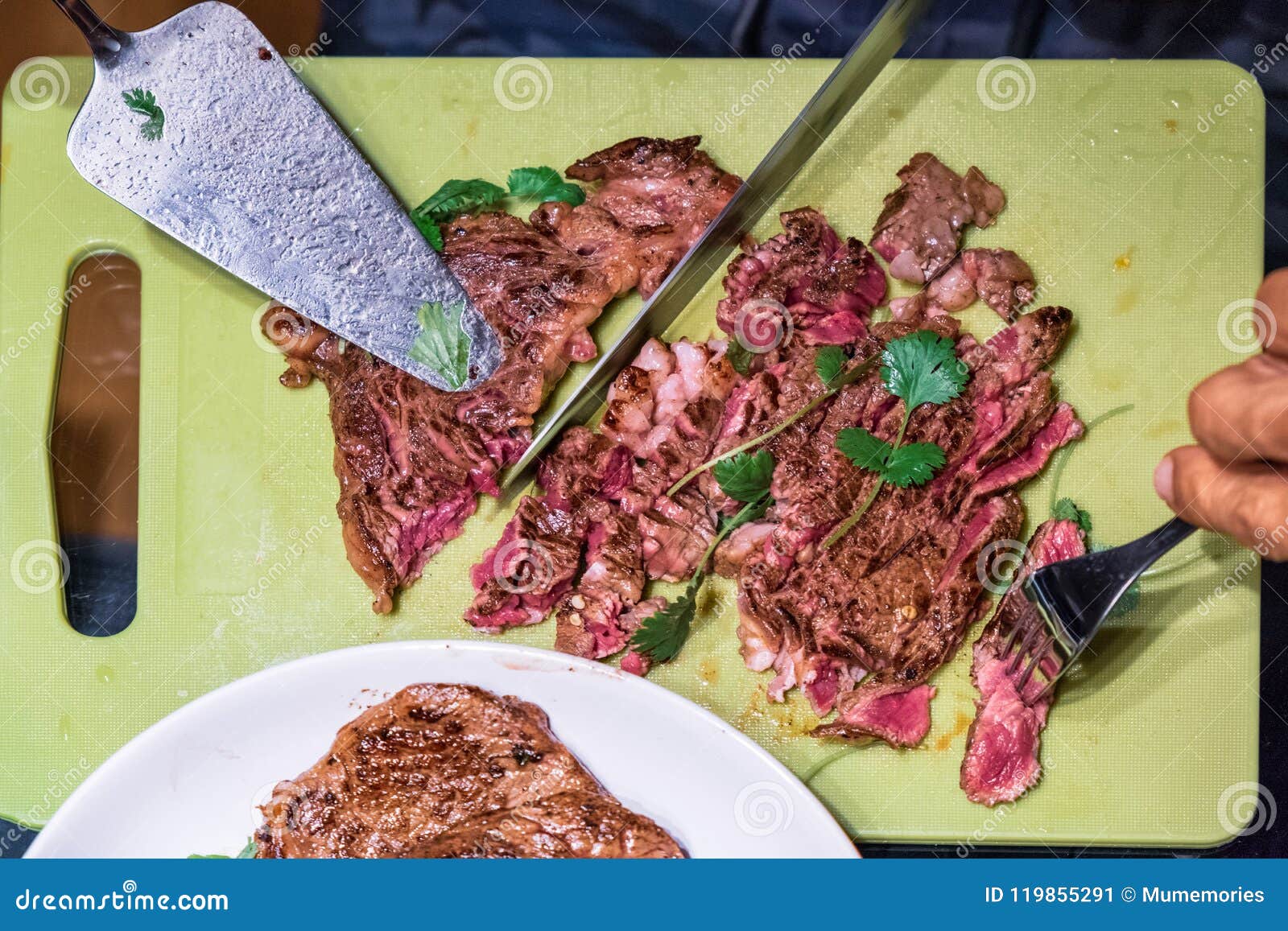 Using Knife Slicing Beef Steak on Chopped Board and Fork Stabbing Beef ...