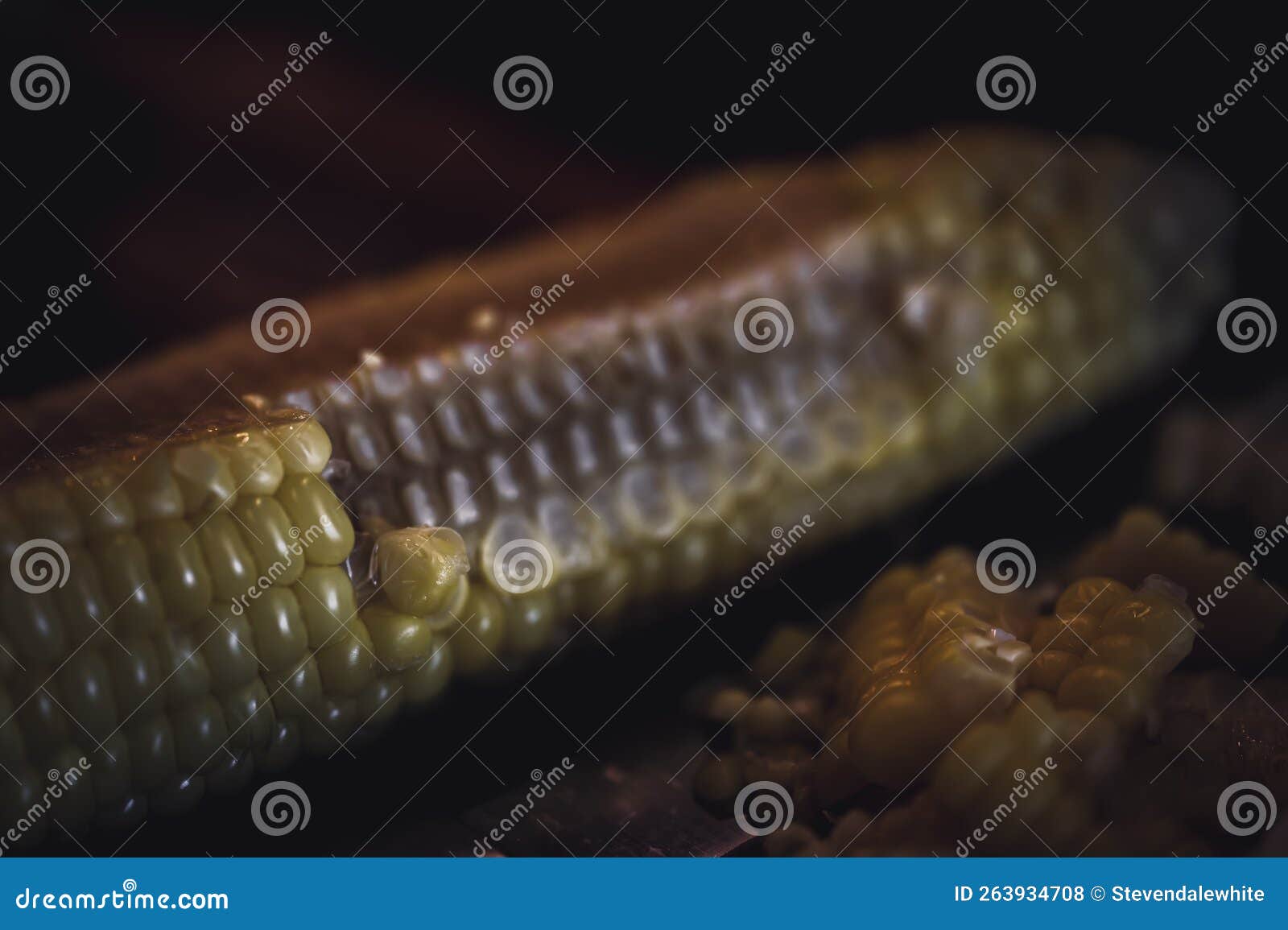 Using a Knife To Remove Kernels from the Cob of an Ear of Sweet Corn ...