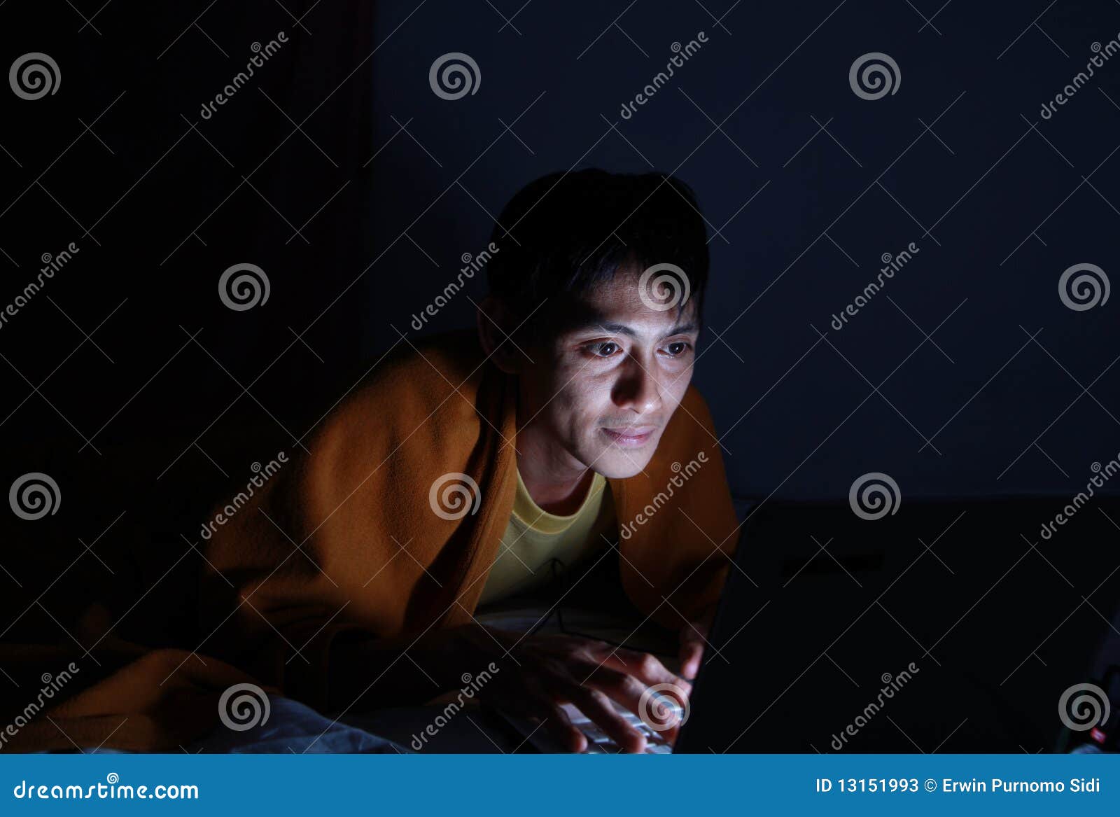 Using Laptop on Bed at Night Stock Image - Image of smile, dark: 13151993