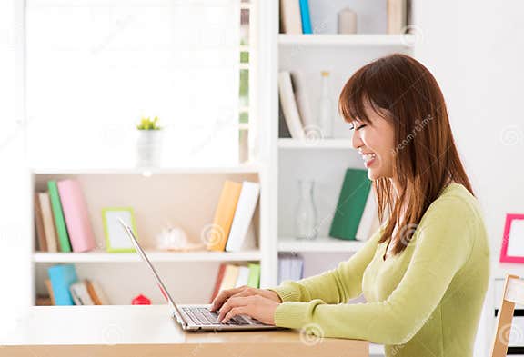 Using laptop computer stock photo. Image of internet - 27760208