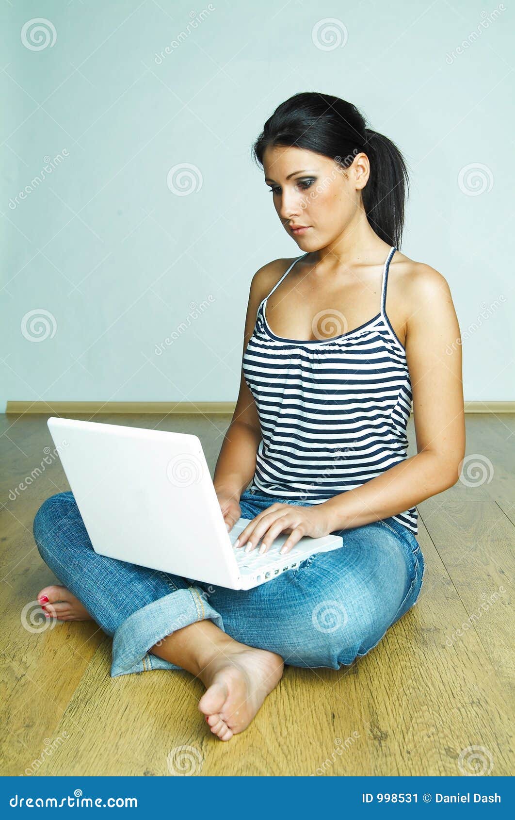 Using laptop computer stock image. Image of furniture, living - 998531