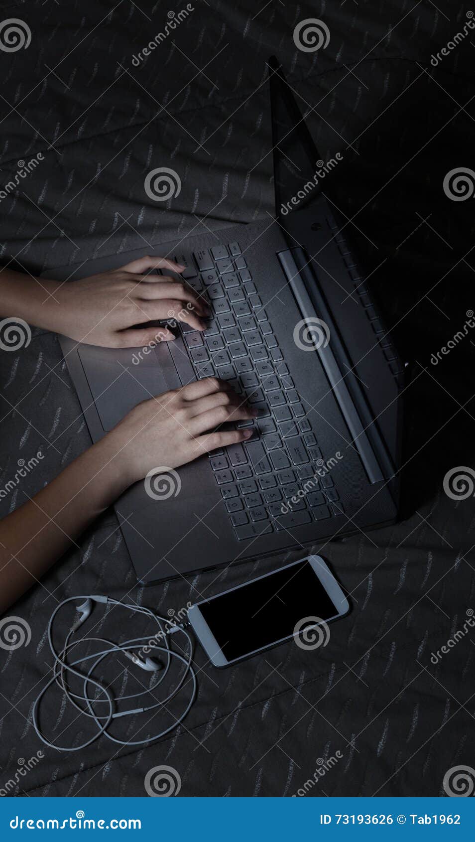 Using Laptop Computer during Bedtime Stock Photo - Image of cellphone ...