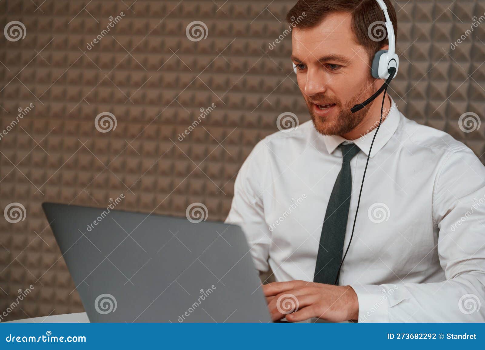 Using Laptop. Handsome Man in Formal Clothes is in the Office Stock ...
