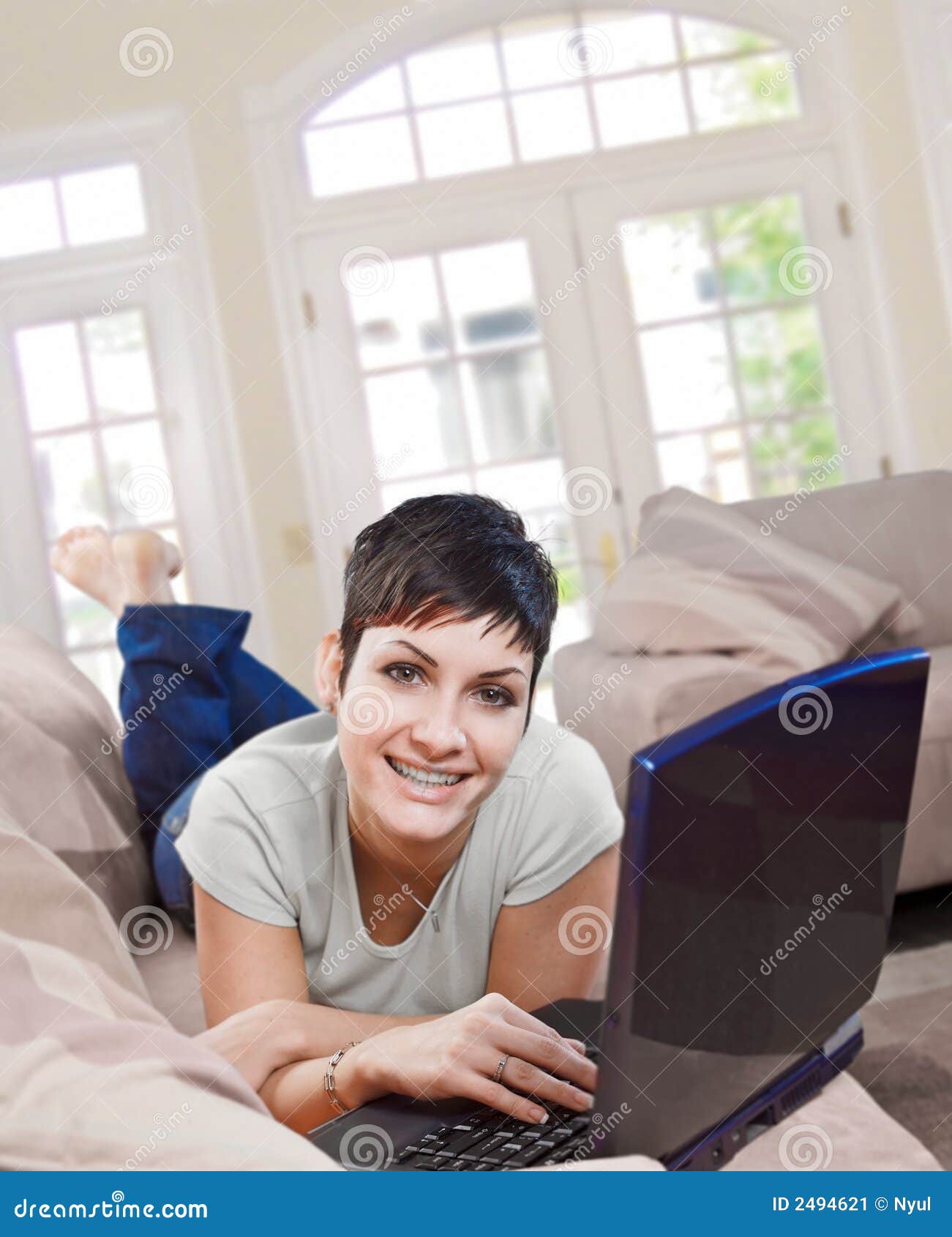 Using laptop at home stock image. Image of internet, casual - 2494621