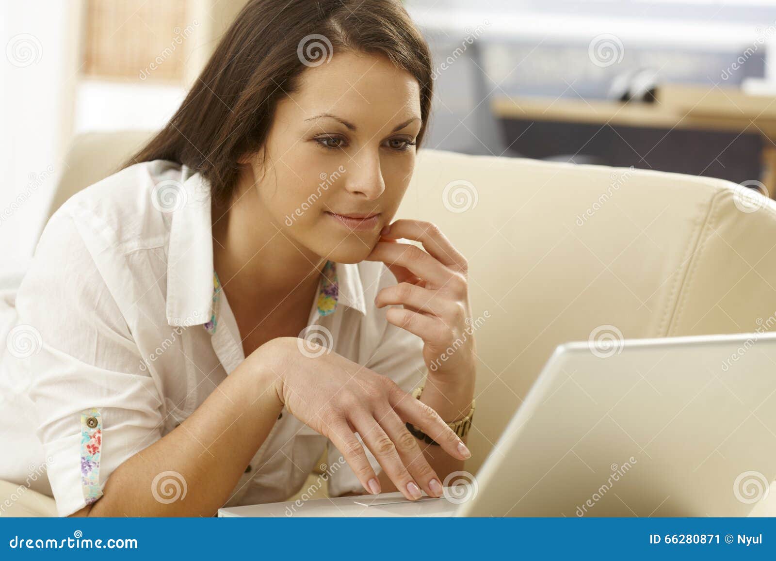 Using laptop at home stock image. Image of concentrating - 66280871