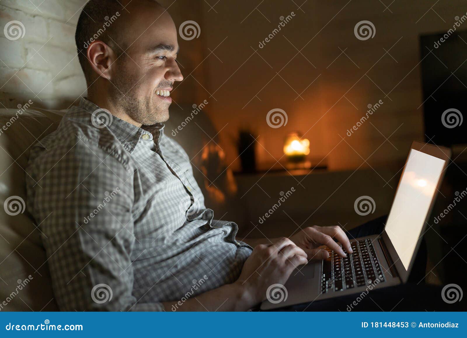 Using a Laptop at Night and Smiling Stock Image - Image of media, smile ...