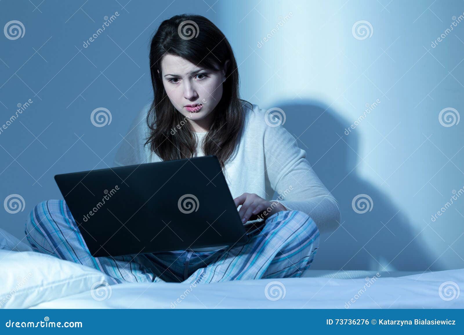Using laptop in the night stock photo. Image of lonely - 73736276