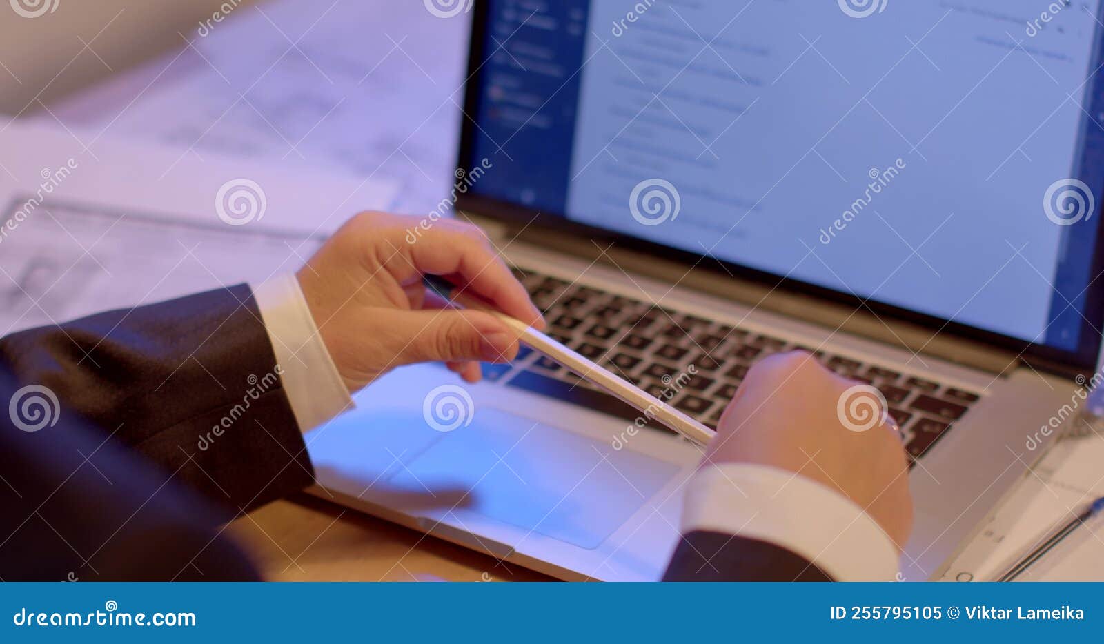 Using a Laptop on Table Employee Presses Application Control Buttons ...