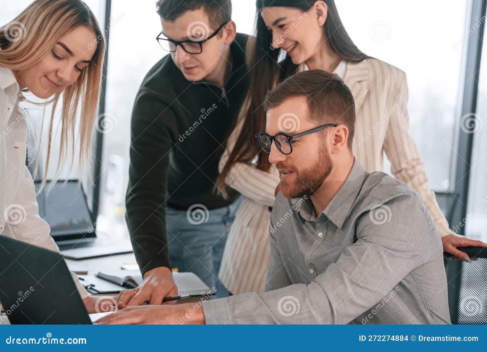 Using Laptops. Successful Team are Working Together in the Office Stock ...