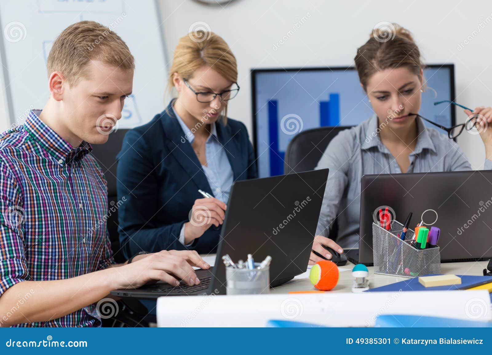 Using laptops at work stock image. Image of modern, screen - 49385301