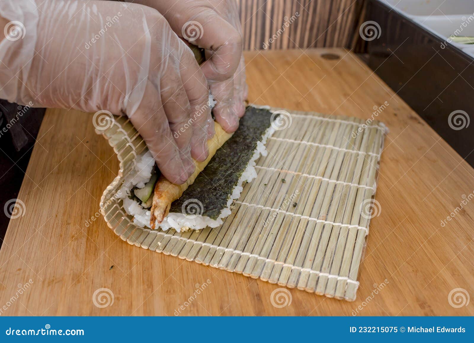 Using a Makisu To Roll a Batch of Tempura Maki Rolls. Making Makizushi ...