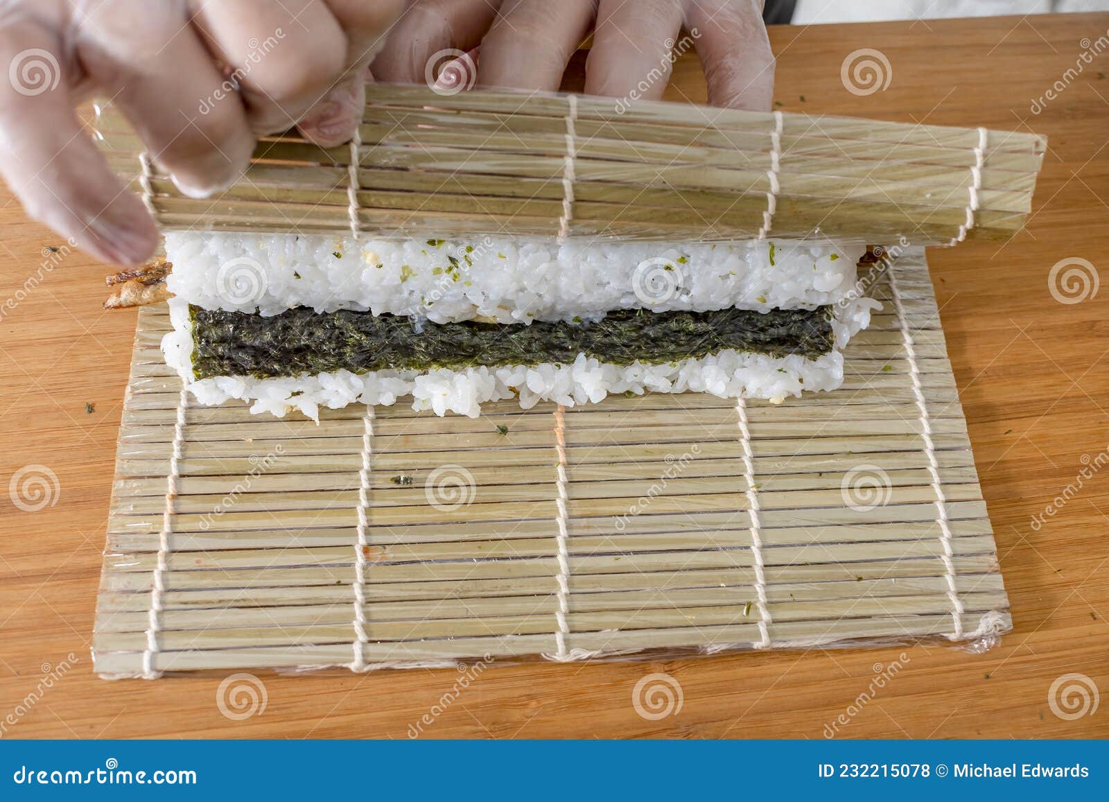 Using a Makisu To Roll a Batch of Tempura Maki Rolls. Making Makizushi ...