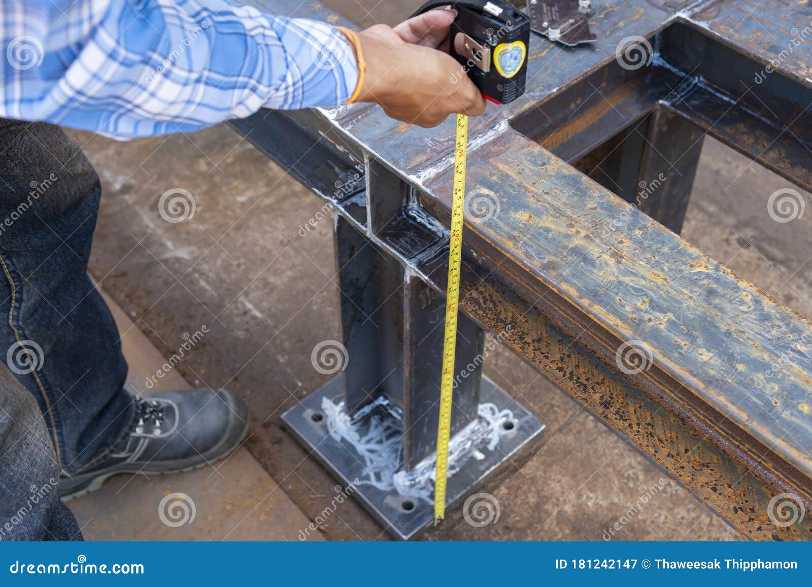 Using a Measuring Tape To Measure the Dimension of Steel Structure Work ...