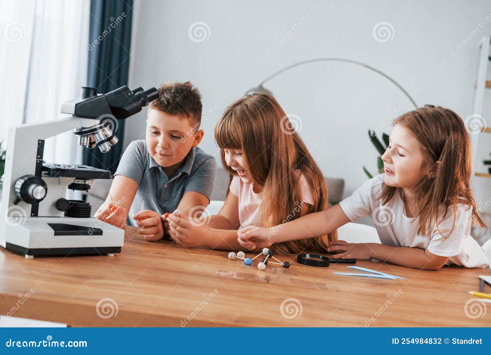 Using Microscope. Kids Having Fun in the Domestic Room at Daytime ...