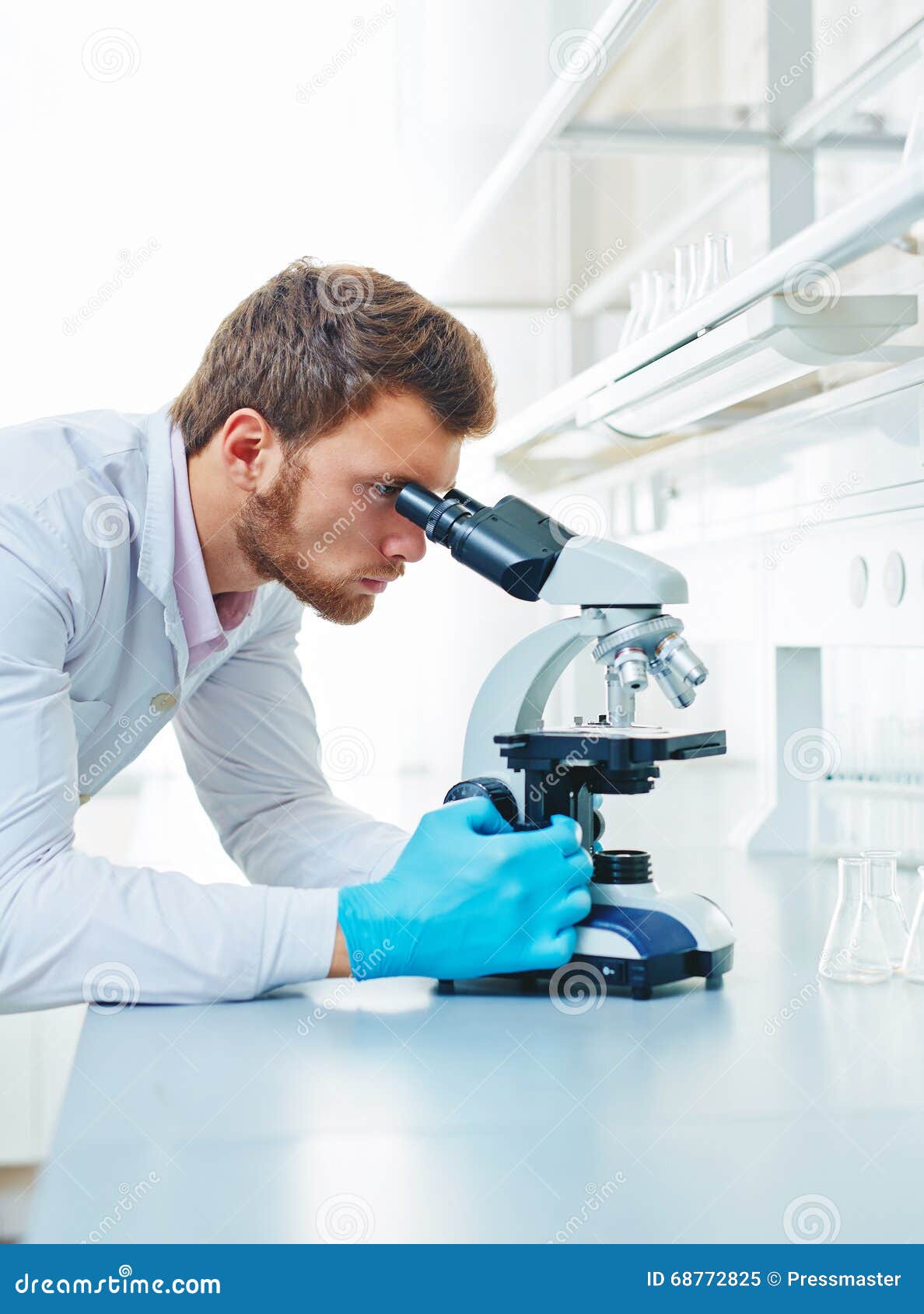 Using microscope stock image. Image of indoors, scientist - 68772825