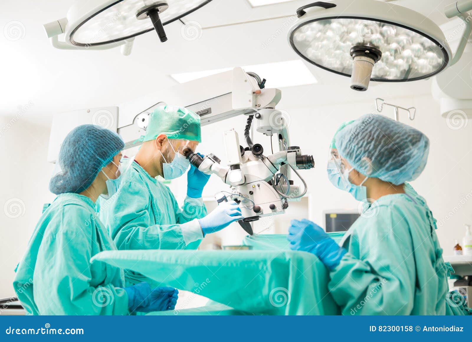 Using a Microscope during Surgery Stock Photo - Image of care, hospital ...