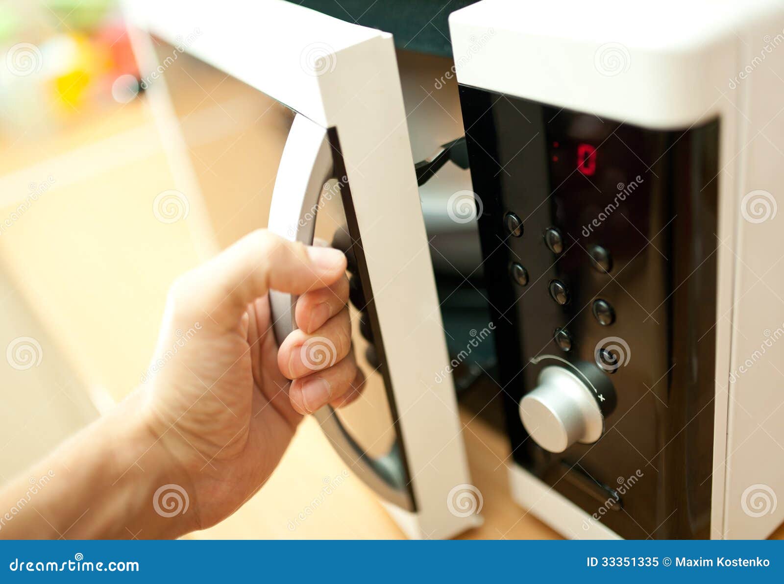 Using microwave oven stock image. Image of heat, microwave - 33351335
