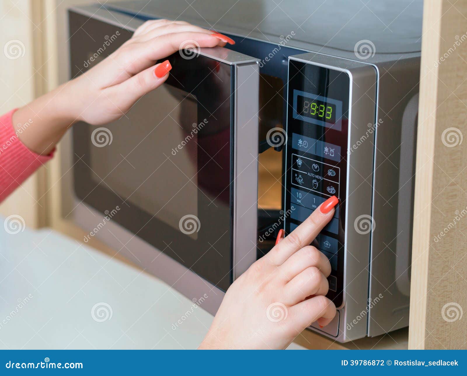 Using microwave oven stock photo. Image of heat, handle - 39786872