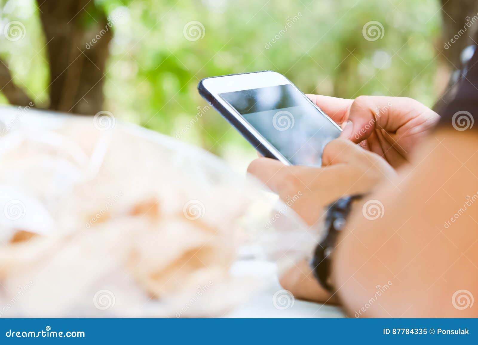 Using mobile devices stock image. Image of hand, person - 87784335