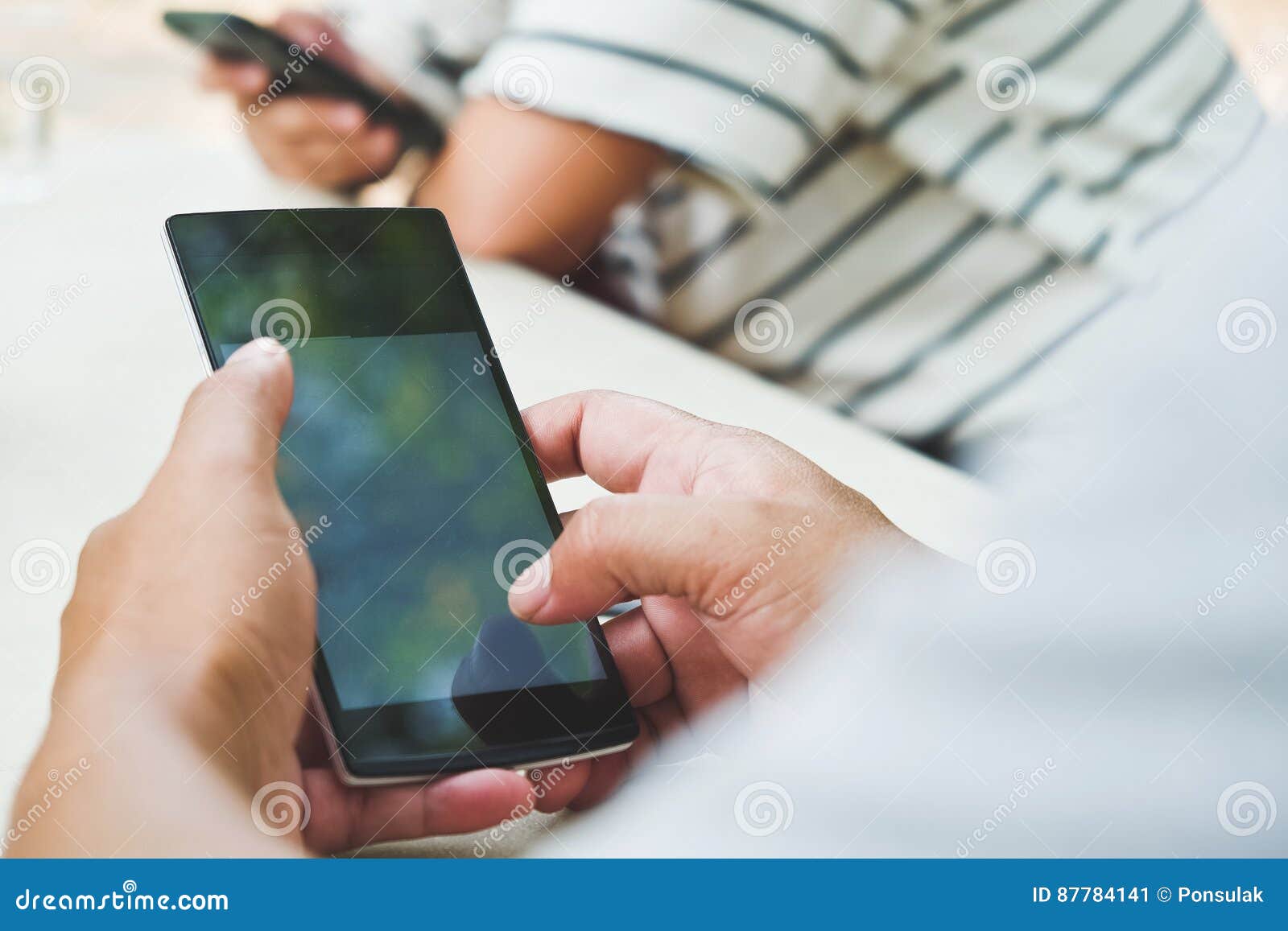 Using mobile devices stock image. Image of holding, adult - 87784141
