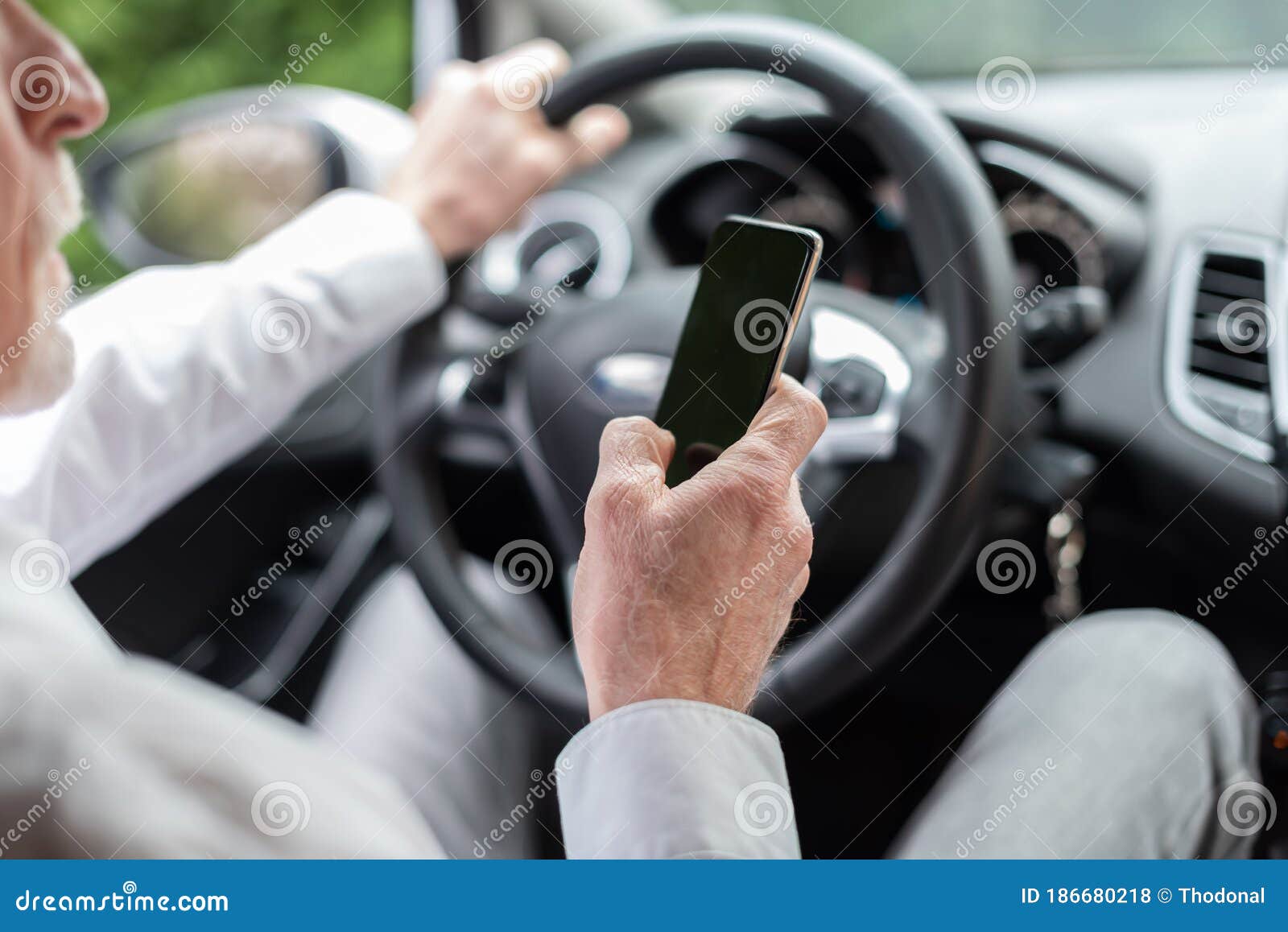 Using Mobile Phone while Driving Stock Photo - Image of person ...