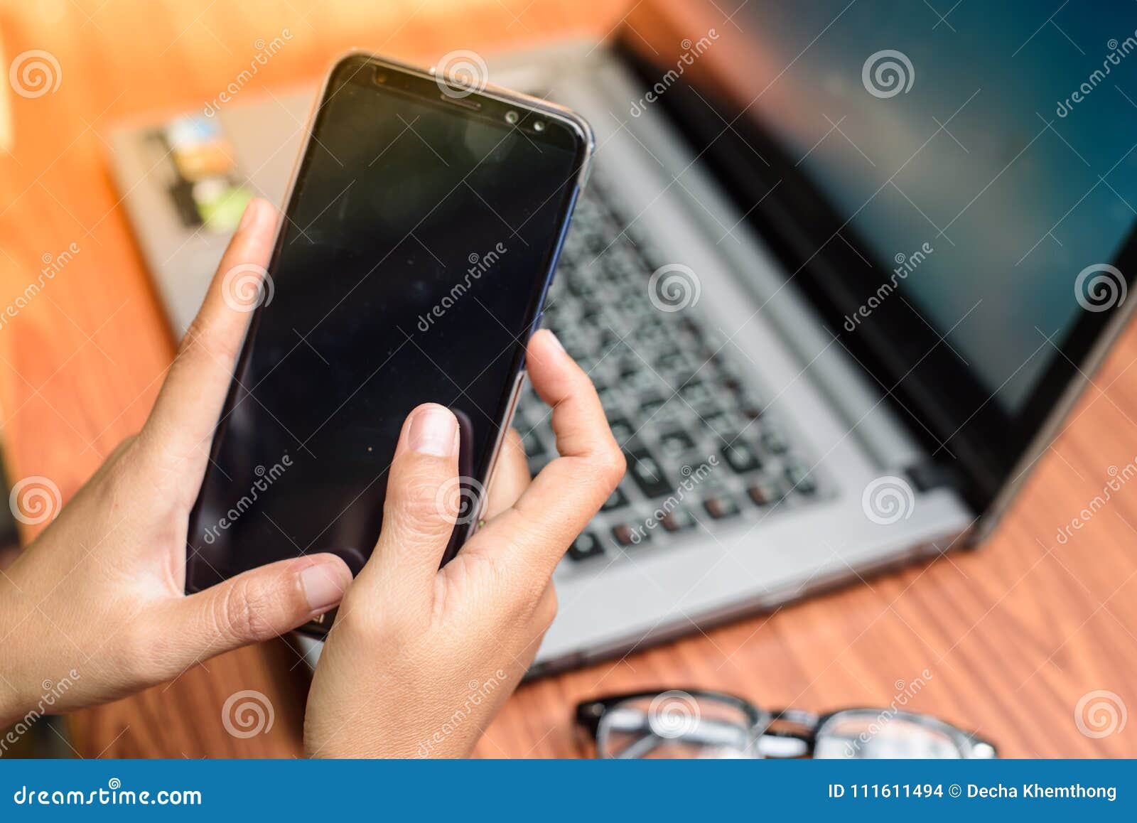 Using Mobile while Working on the Computer. Stock Photo - Image of ...