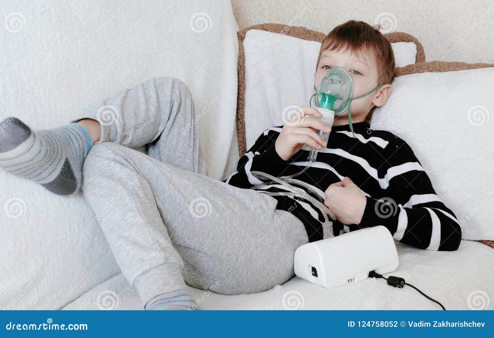 Using Nebulizer and Inhaler for the Treatment. Boy Inhaling through ...