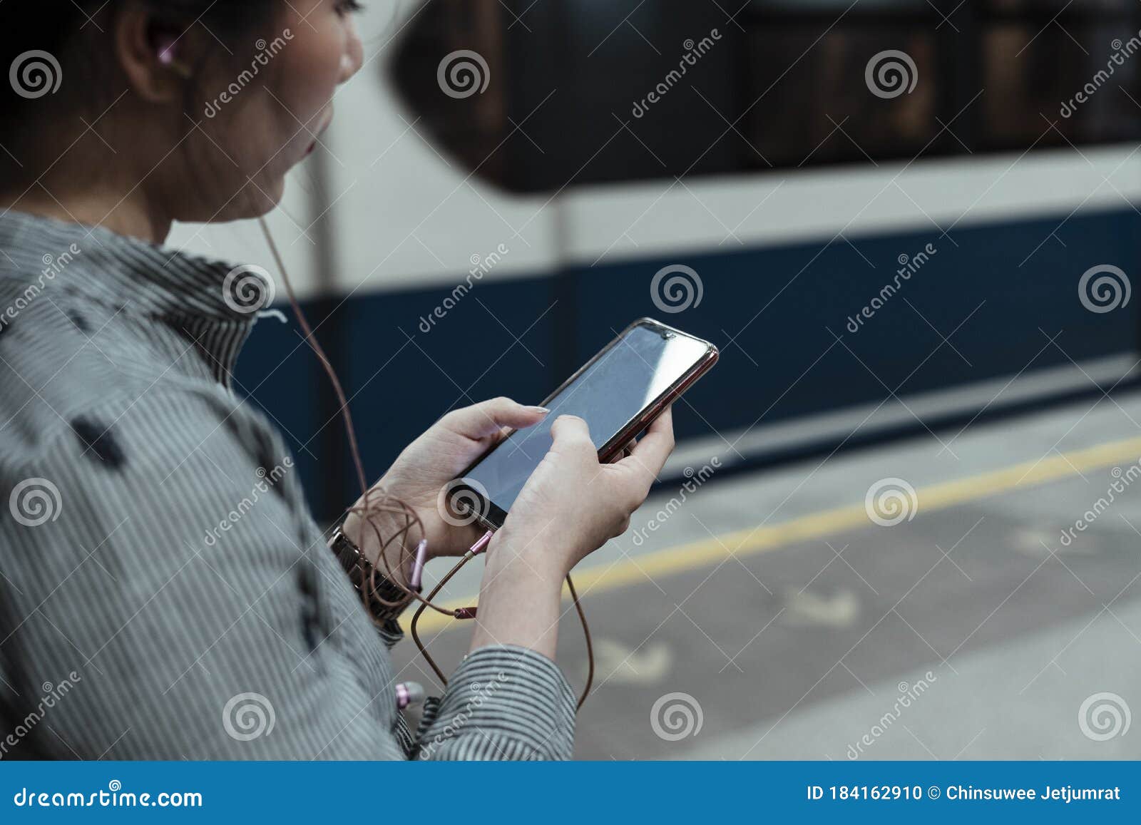 Using a Phone at the Platform Stock Photo - Image of metro, night ...