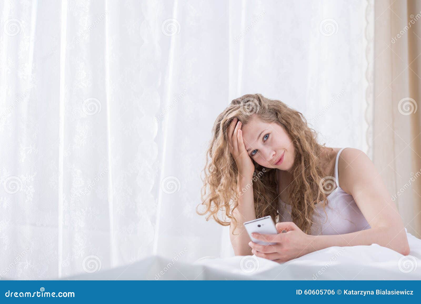 Using Phone after Waking Up Stock Photo - Image of home, beauty: 60605706