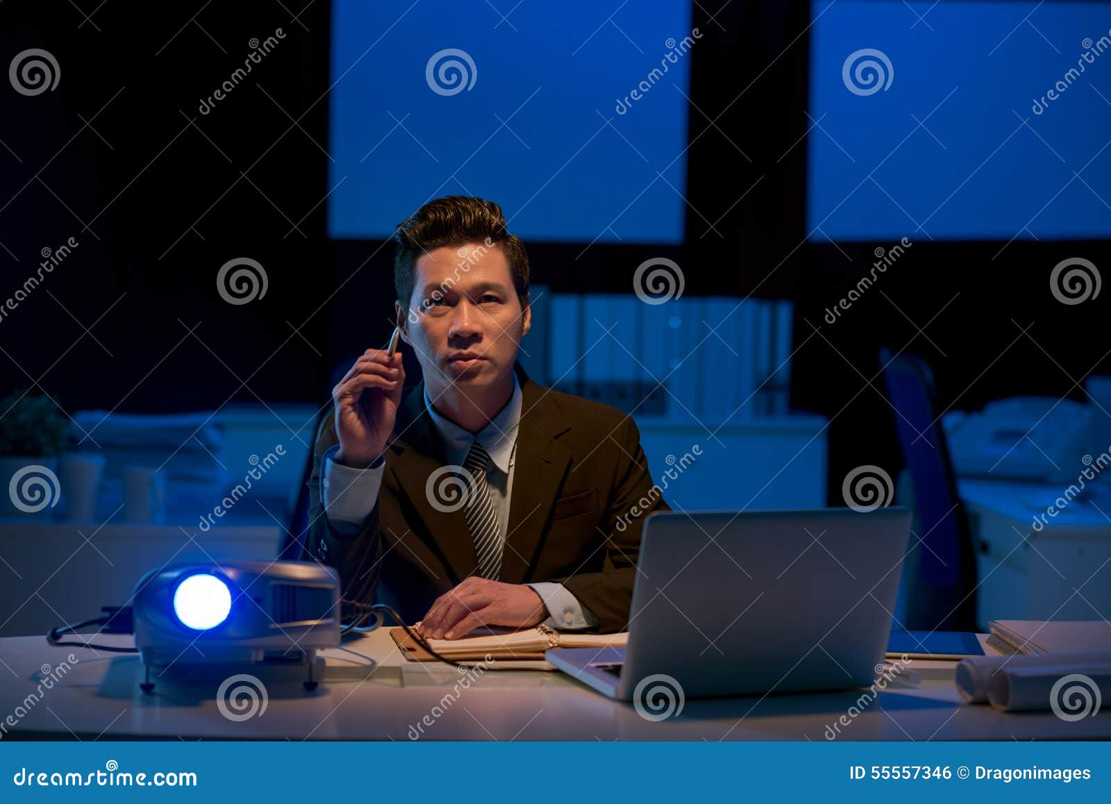 Using projector stock photo. Image of presentation, sitting - 55557346