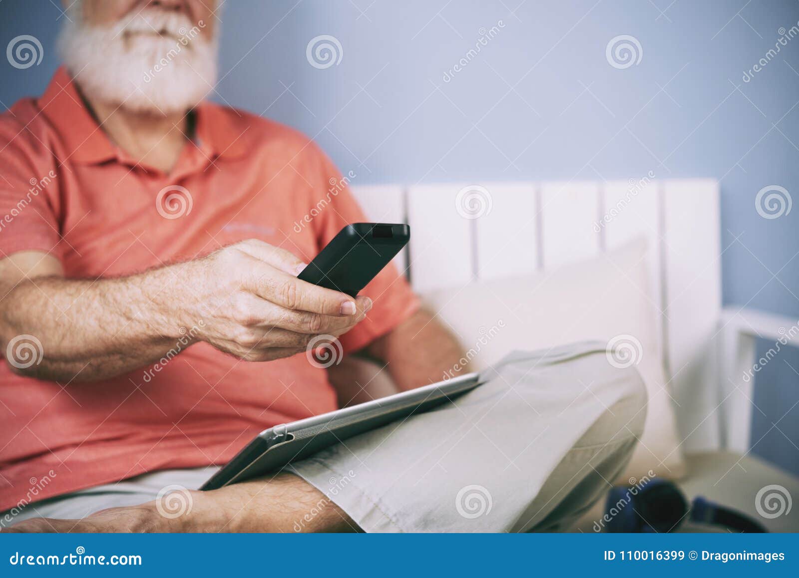 Using remote control stock image. Image of aged, remote - 110016399