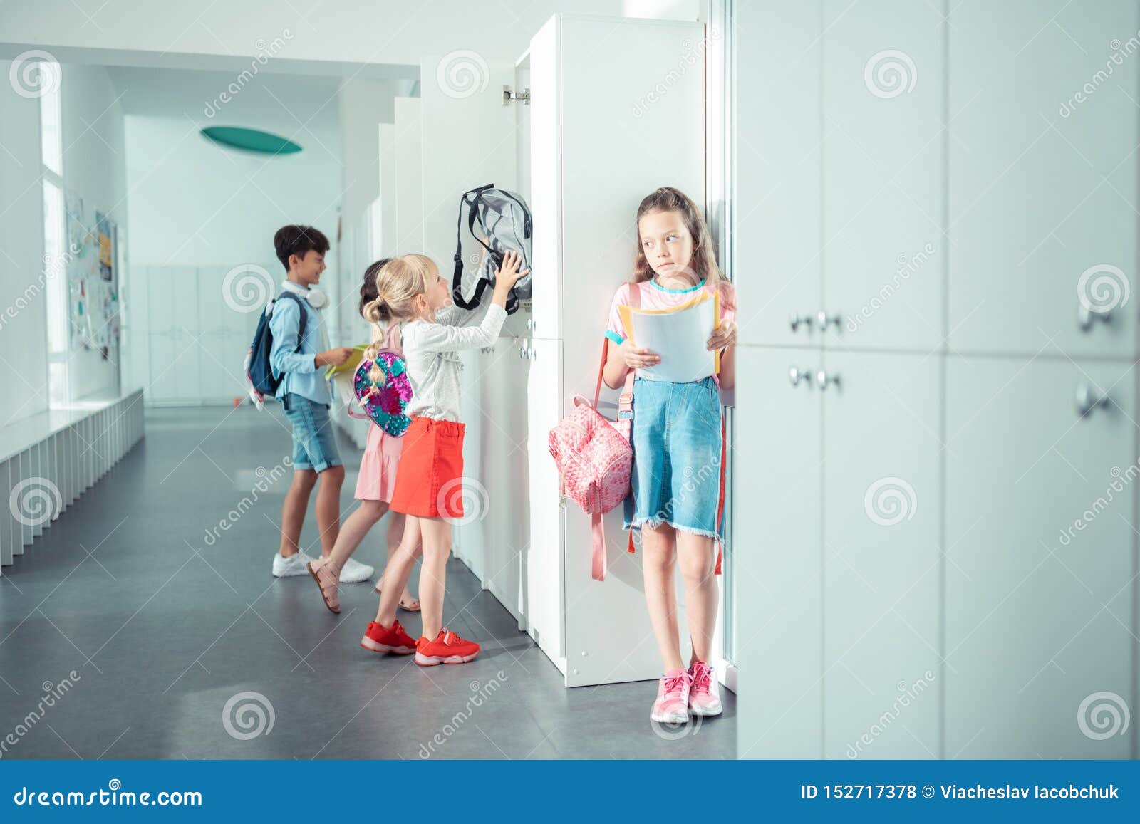 Children Using Their School Lockers while Having Break from Lesson ...