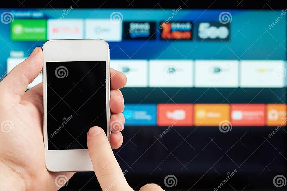 Using Smartphone As Remote Control Stock Photo - Image of multimedia ...