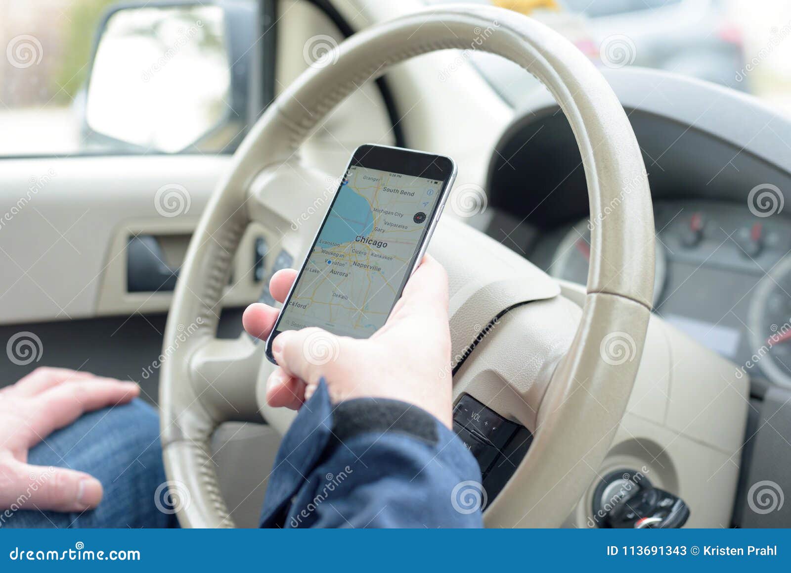 Using a Smartphone for Directions while Driving Stock Image - Image of ...