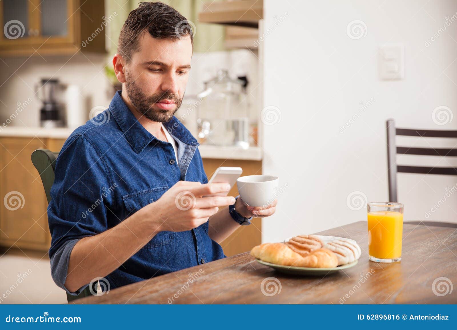 Using a Smartphone Over Breakfast Stock Photo - Image of lifestyle ...