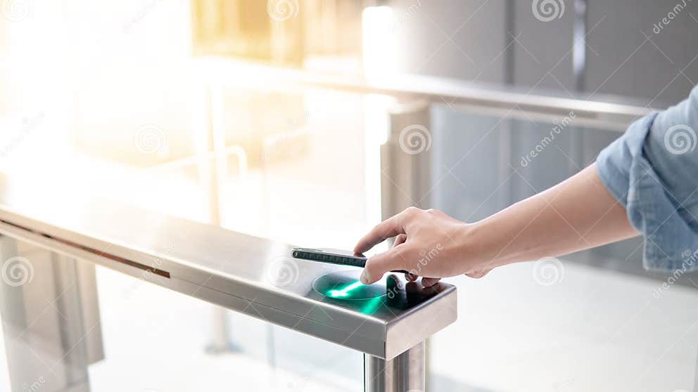 Using Smartphone To Open Automatic Gate Machine Stock Photo - Image of ...