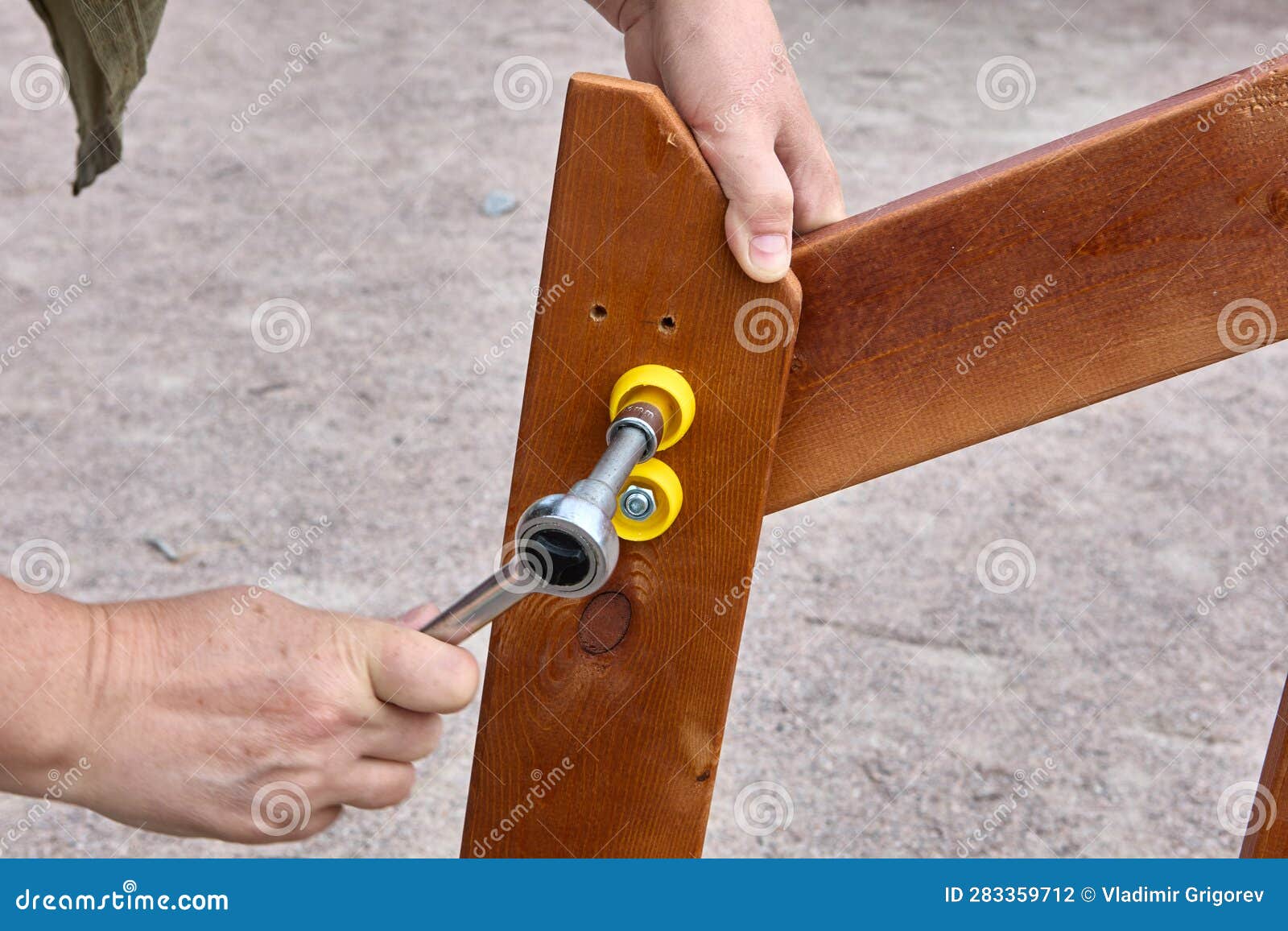 Using Socket Hex Wrench when Assembling Outdoor Furniture, Hand of ...