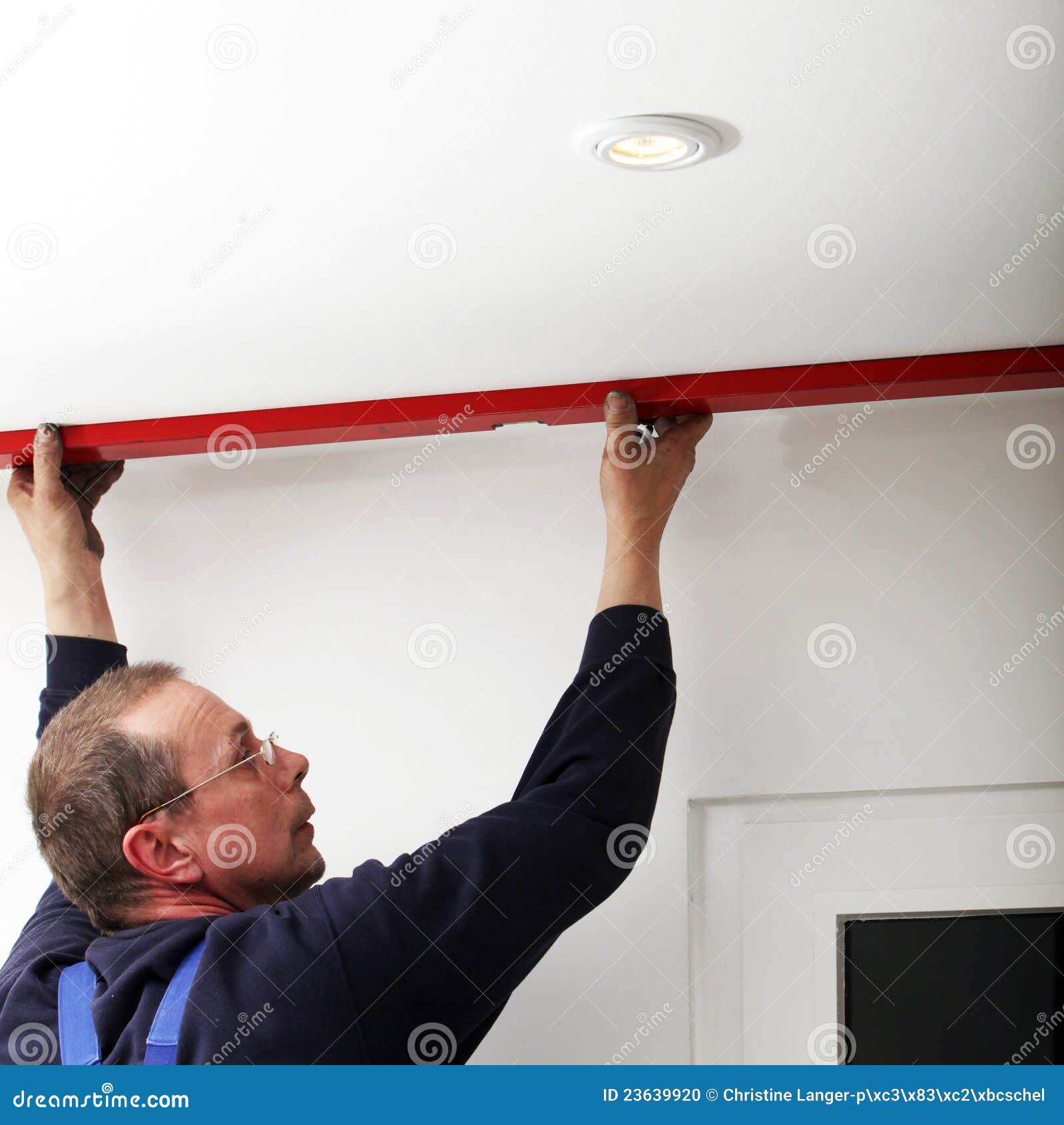 Using a Spirit Level stock photo. Image of renovation - 23639920
