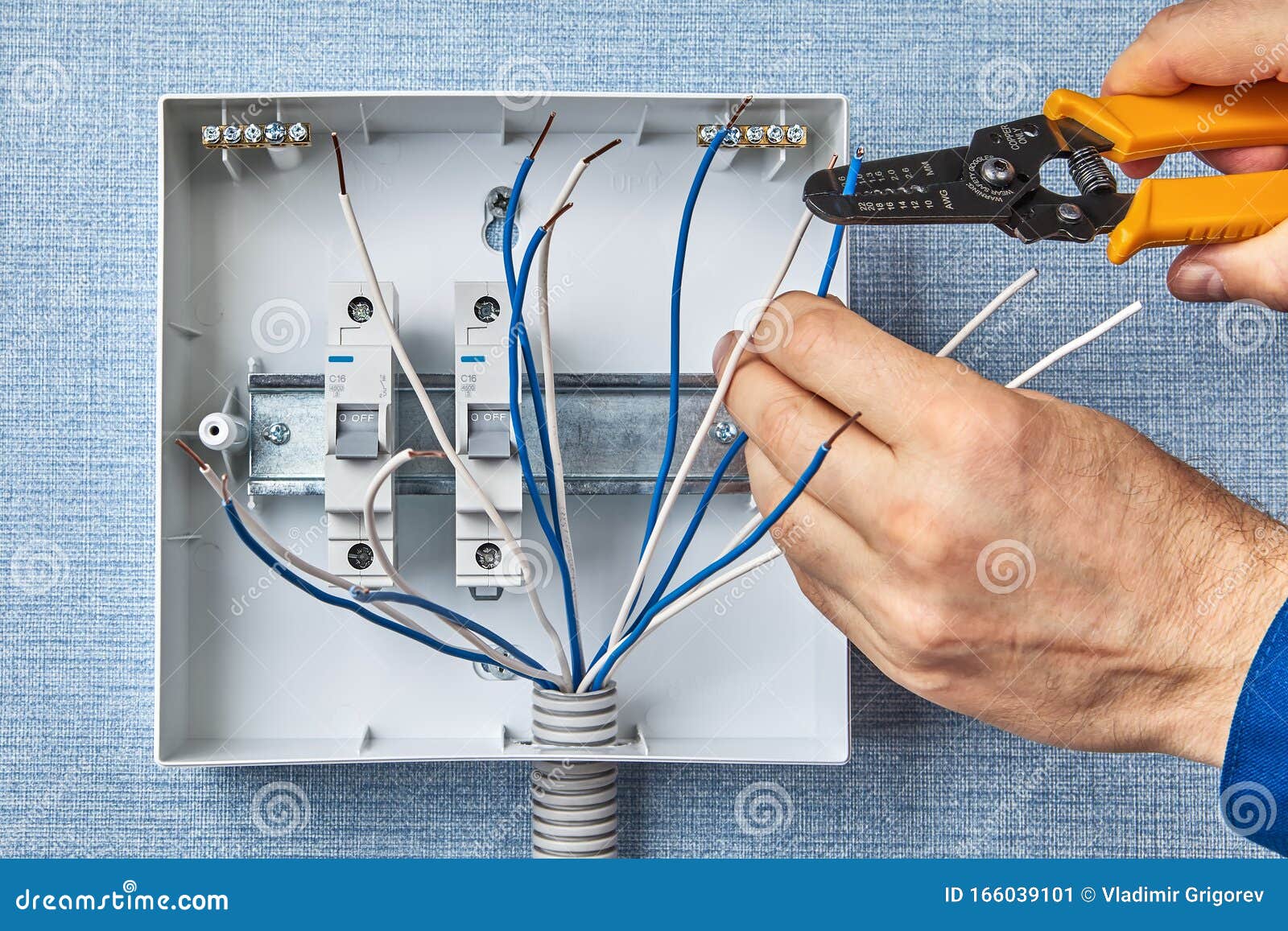Using a Stripping Tool for Mounting Electrical Box Stock Image - Image ...
